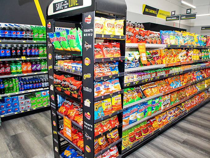 The snack aisle—where diet intentions go to die and flavor dreams come true. Doritos, Mountain Dew, and temptation as far as the eye can see.