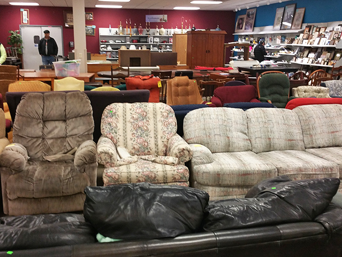 The sofa section: where 1970s floral patterns meet leather recliners in a comfortable time warp that somehow feels like visiting your grandparents' basement&mdash;in the best way.