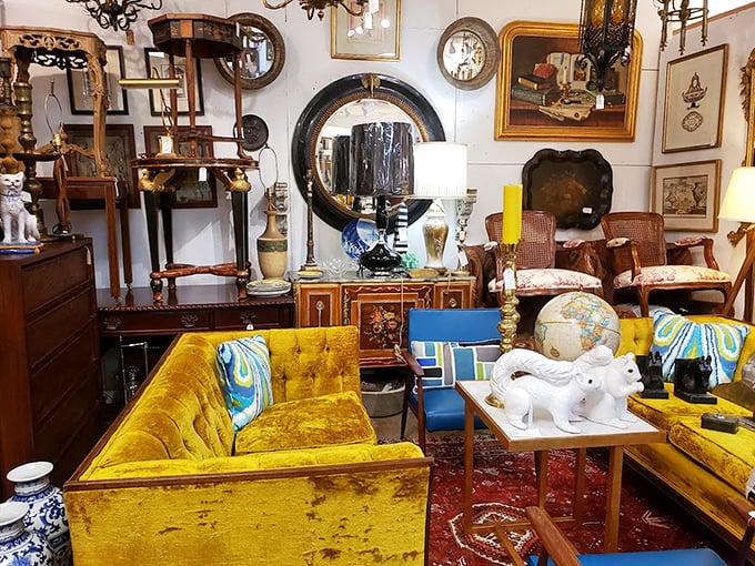 Mustard velvet sofas that would make Wes Anderson weep with joy. Sitting areas staged like film sets from different decades.