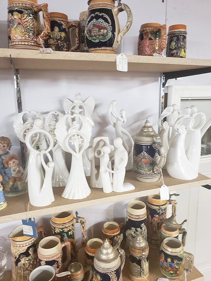 German steins and porcelain angels stand at attention like an oddly peaceful army. Your grandmother's china cabinet is calling, and it wants reinforcements.