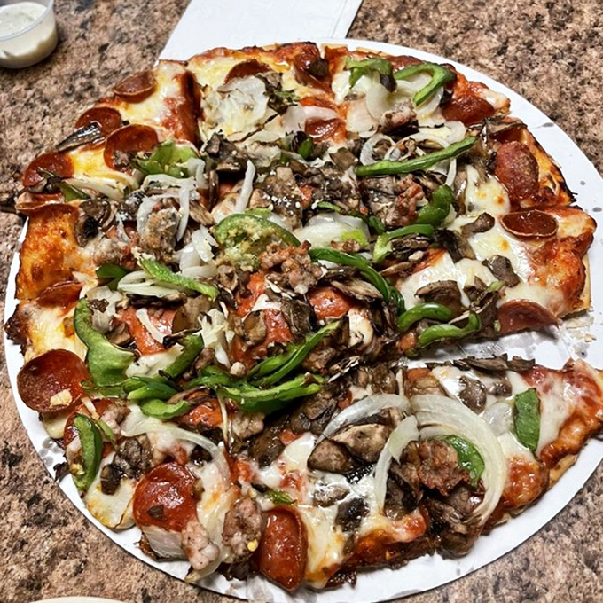 Not all heroes wear capes. Some come loaded with pepperoni, sausage, green peppers, and enough cheese to make Wisconsin nervous.