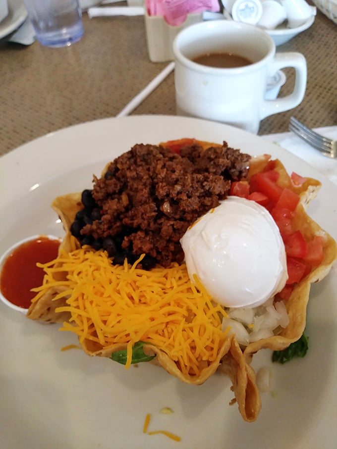 Behold the legendary taco salad&mdash;where seasoned beef, cheese, and fresh veggies unite in crispy tortilla harmony.