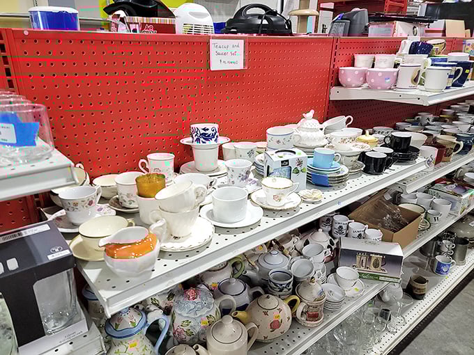 Teacups and mugs create a cafeteria-worthy collection where vintage china meets everyday dishware at prices that encourage collecting multiple sets.