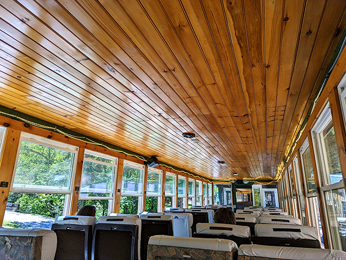 Warm wooden ceilings and panoramic windows transform this vintage car into Kentucky's coziest living room. Just missing your grandmother's afghan throw.