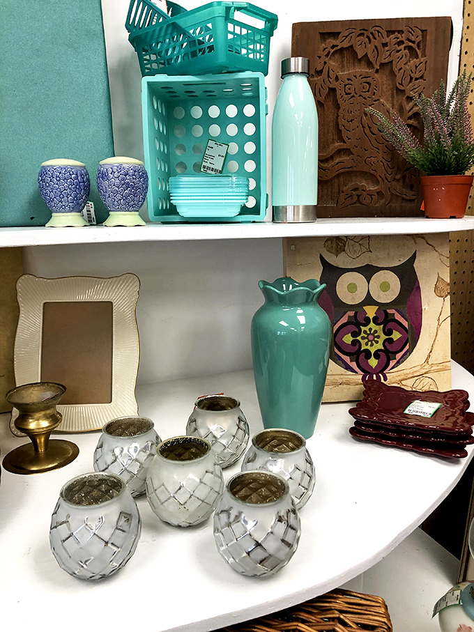 Turquoise vases and crystal candle holders create a color story that's part coastal Maine, part "I could totally stage a fancy dinner with these."