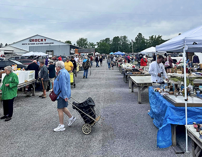 The weekend warriors of commerce line this gravel thoroughfare, where shopping carts replace grocery baskets and haggling is an art form.