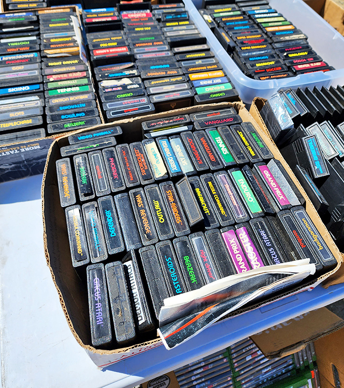 Gaming history stacked in plastic cartridges. Each one contains worlds that once consumed entire weekends of our youth.