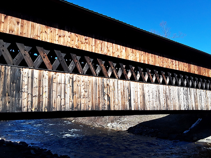 The bridge's distinctive lattice design isn't just pretty&mdash;it's engineering genius disguised as rustic architecture.