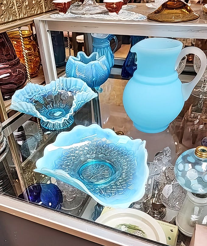 Blue opalescent glass catches light like North Dakota's summer sky. Grandmother's special occasion pieces now await new celebrations.