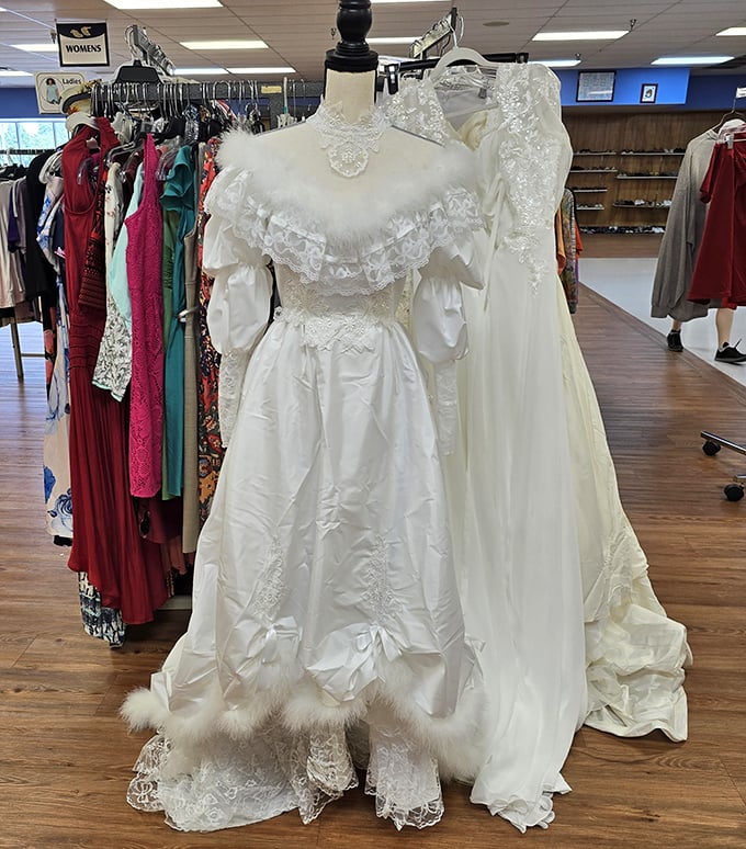Vintage wedding dresses hang like ghosts of celebrations past, ready for a second chance at matrimonial magic.