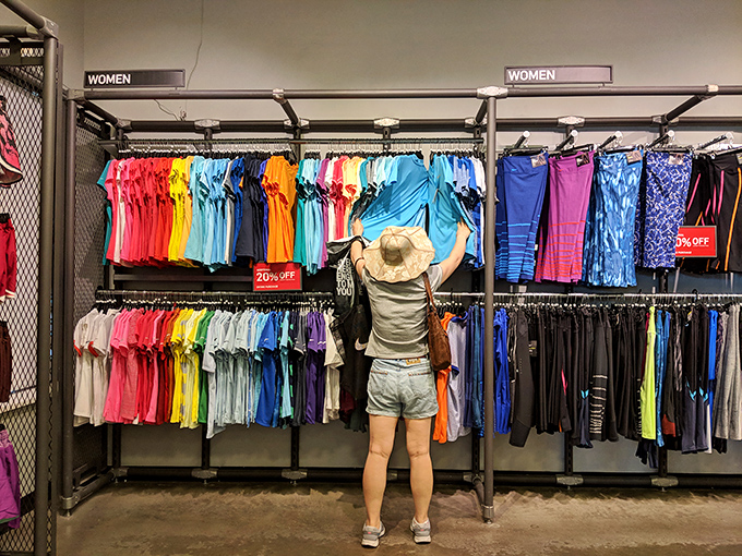 A rainbow explosion of activewear awaits the determined shopper. That 20% off sign isn't just a discount&mdash;it's permission.
