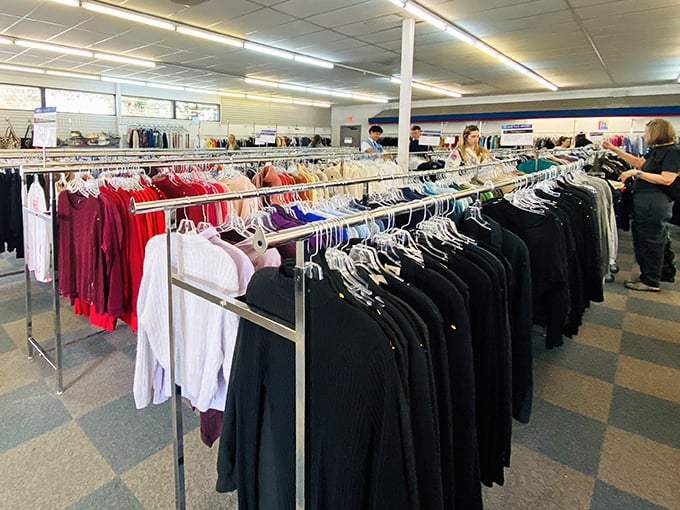 Color-coded clothing racks stretch toward the horizon like a retail rainbow, each hanger potentially holding your next favorite outfit.
