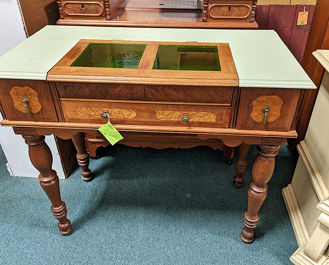 Handcrafted furniture like this wooden writing desk once anchored family correspondence before email ruined everything.