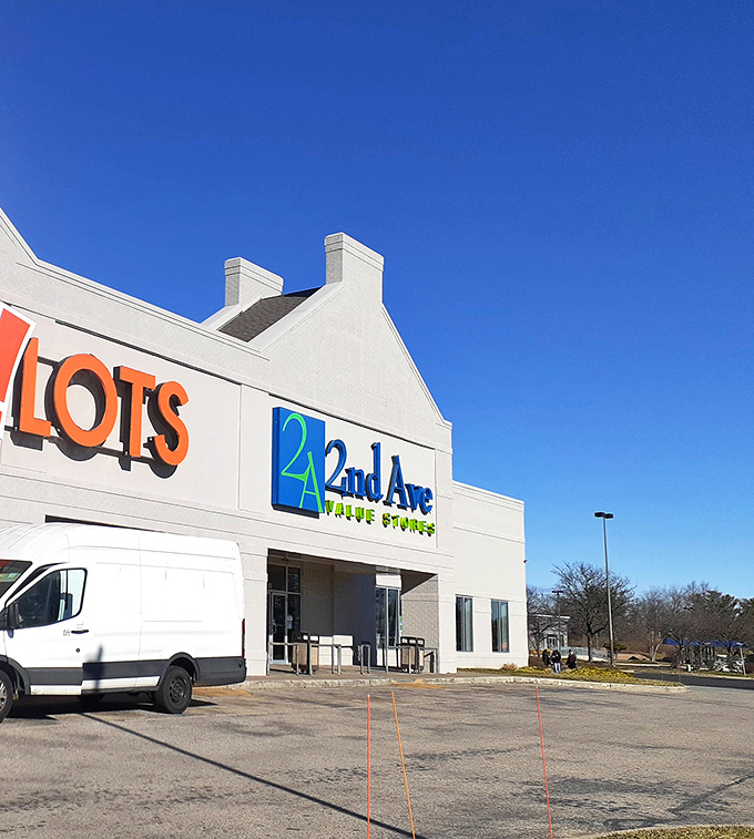 The bright blue 2nd Ave sign beckons like a lighthouse for bargain hunters. Treasure awaits inside this thrifting paradise!