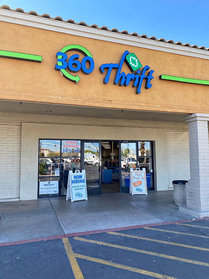 360 Thrift's vibrant blue and green signage pops against the desert backdrop &ndash; a colorful oasis of bargains.