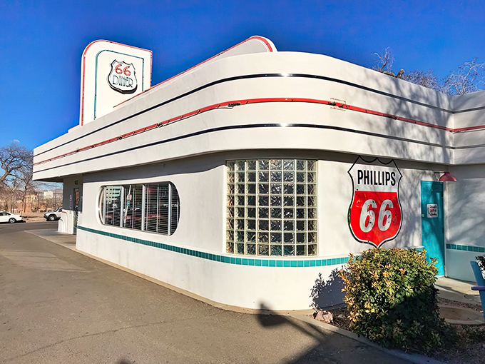 That gleaming chrome exterior screams "authentic diner experience" louder than any vintage jukebox could. 