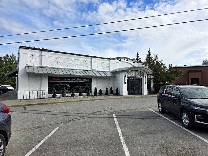 Chopped & Chowdered's pristine white building stands guard over seafood treasures. Those little evergreens are your first clue!