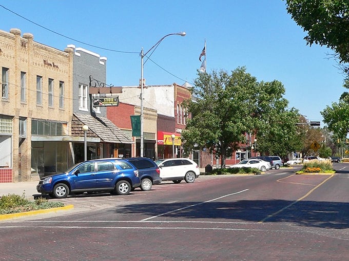 The main street stretches endlessly, lined with old storefronts and steady movement, a scene both calm and captivating to watch.