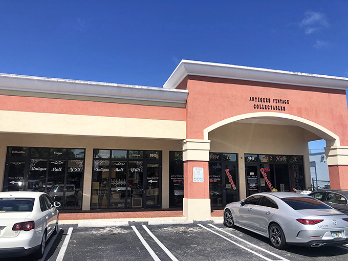 That welcoming coral-and-cream storefront promises treasures inside where memories wait to be rediscovered and cherished.