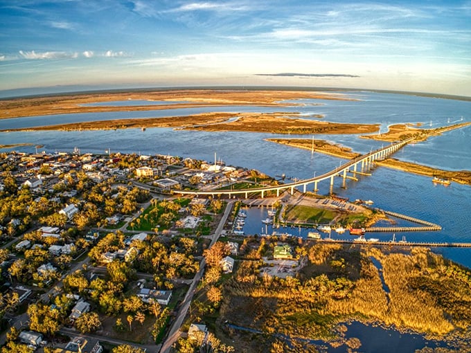 Aerial view of Apalachicola shows nature's perfect balancing act &ndash; where river meets bay in a watercolor of blues and greens.