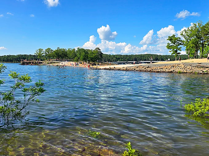 Asphalt Beach defies its quirky name with picture-perfect waters. The kind of place where stress dissolves faster than an ice cube in July.