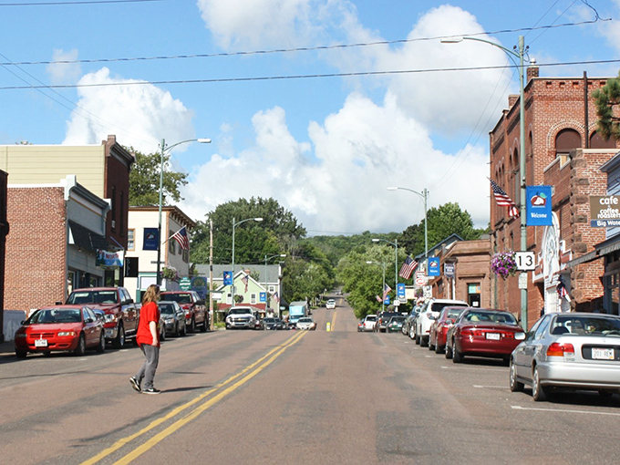 Bayfield's colorful storefronts stand like a painter's palette against the Wisconsin sky, inviting you to slow down and explore each vibrant doorway.