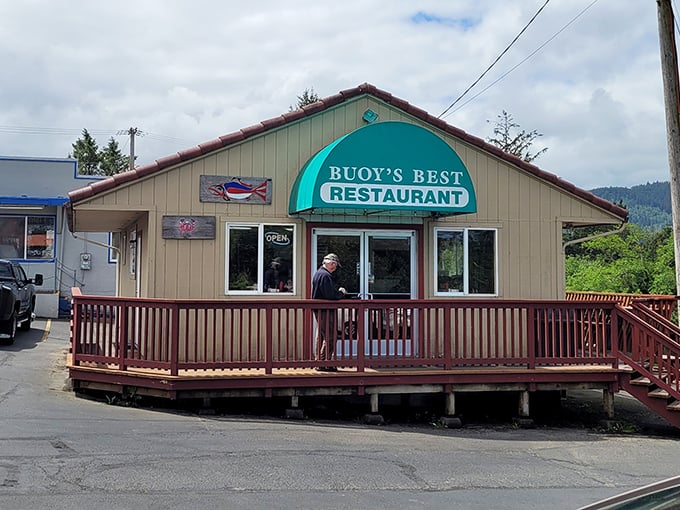 Buoy's Best welcomes hungry travelers with its cheerful teal sign. Simple on the outside, seafood magic on the inside.