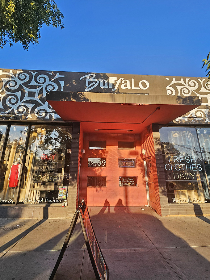 Urban thrift chic! Buffalo Exchange's swirling patterns and coral entrance create the perfect backdrop for fashion-forward secondhand shopping adventures.