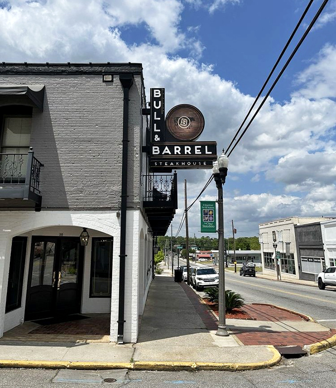 Downtown charm meets steakhouse sophistication in this perfectly positioned corner spot that beckons beef lovers.