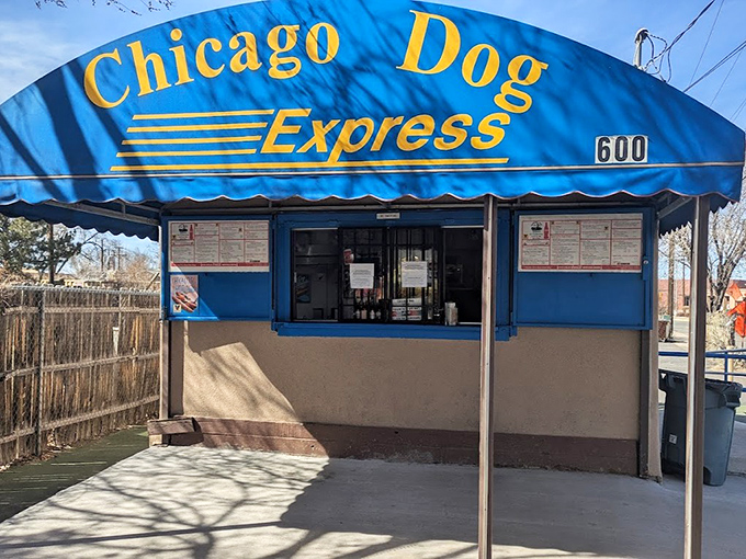 That blue awning is like a beacon for Chicago dog purists. No ketchup allowed in this authentic slice of Windy City flavor!