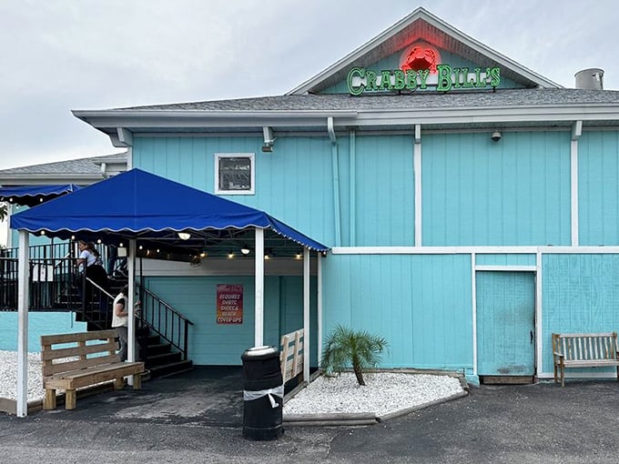 Crabby Bill's turquoise exterior stands out like a tropical jewel. This St. Pete Beach landmark proves that "crabby" only applies to the name, not the experience!
