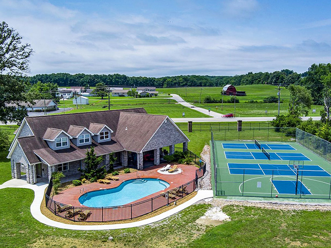 Crossville offers country living with modern amenities. Just look at that beautiful home with both a pool and tennis court!