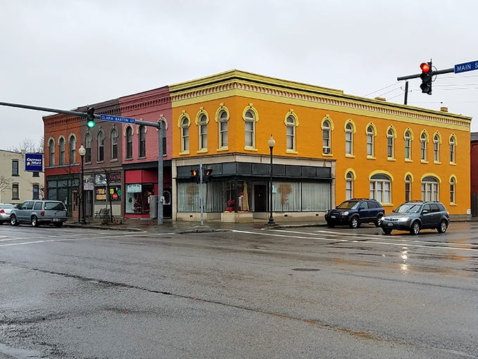 Historic brick buildings stand proudly at Dansville's main intersection, their colorful facades telling stories of small-town America's golden age.