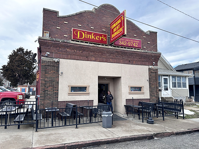 Dinker's brick fa&ccedil;ade has witnessed decades of burger bliss&mdash;a time capsule of flavor in Omaha's evolving food scene.