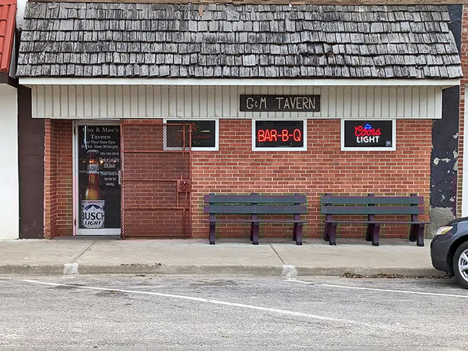 Guy & Mae's Tavern keeps it refreshingly simple - a brick building with a neon sign that promises BBQ bliss. No frills, just thrills!