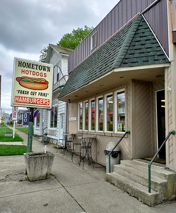 Hometown Hot Dogs' charming storefront promises the kind of no-nonsense comfort food that makes you nostalgic for summers you haven't even had.