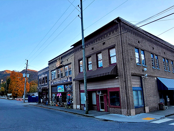 Historic brick buildings line streets where Appalachian Trail hikers refuel and locals gather daily.