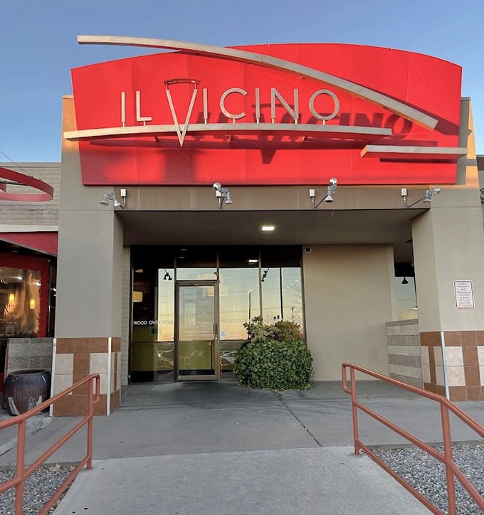 Il Vicino's wooden doors open to reveal pizza paradise. Like finding Italy tucked away in an Albuquerque strip mall.