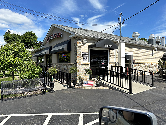John & Maria's stone-accented building stands ready for pizza duty. That "Take Out" sign might be the most important road sign in East Haven.
