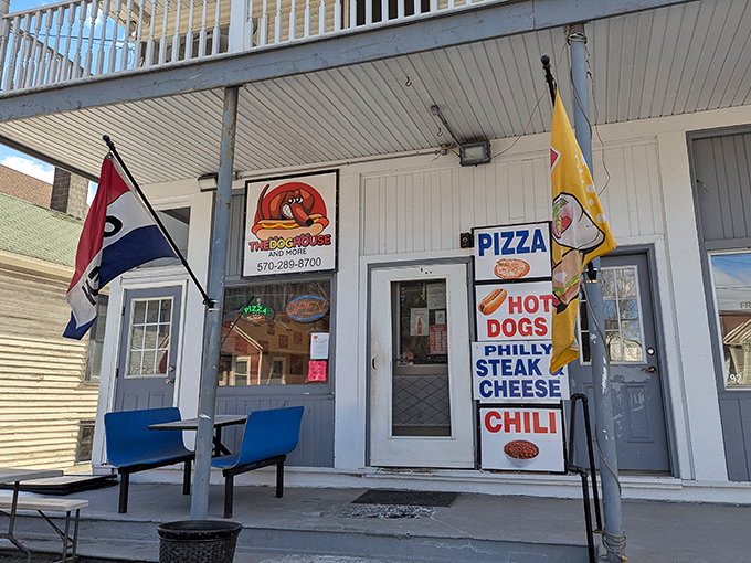 KT's Dog House brings small-town charm and big flavor to Hop Bottom with its homey, flag-flying exterior.