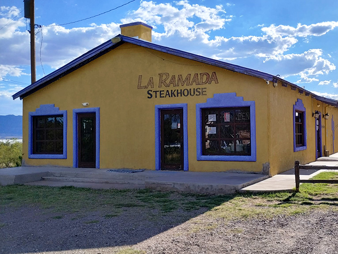 La Ramada's sunny yellow building stands out like a beacon for beef lovers. A colorful promise of Southwestern steak perfection.