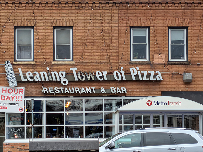 Leaning Tower of Pizza's corner location proves great pizza puns deserve prime real estate.