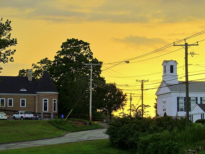 Ledyard's church steeple pierces a golden sunset sky – Norman Rockwell couldn't have painted a more perfect small-town scene.