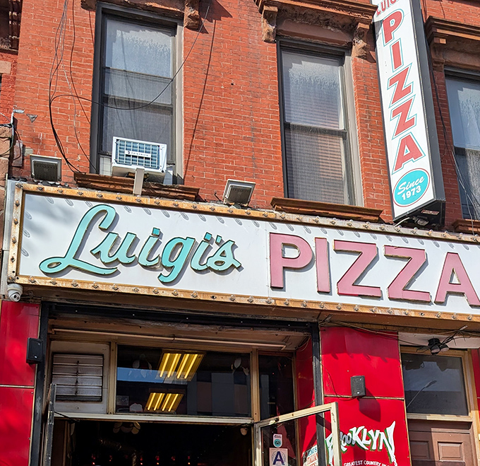Luigi's Pizza: That vintage sign has witnessed decades of pizza perfection - Brooklyn's answer to the fountain of youth.