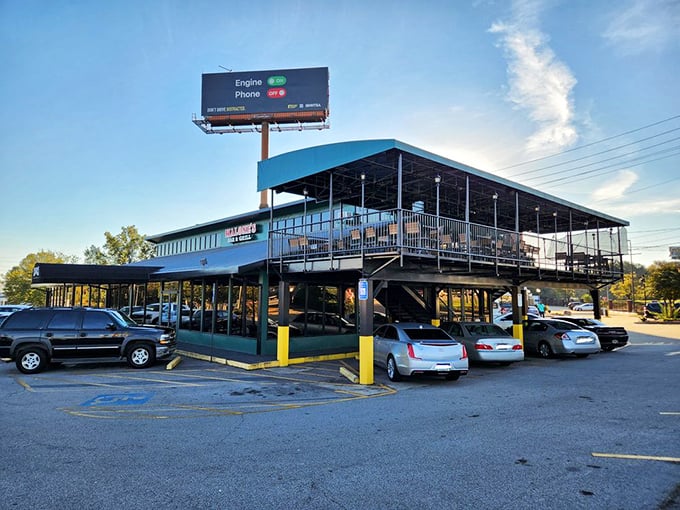 Malone's two-story setup looks like the clubhouse for the "Serious About Steak" society. That rooftop dining area calls your name!