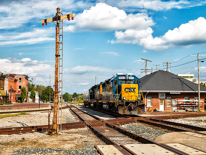 A train rolls through North Vernon, connecting this budget-friendly town to the wider world while keeping prices down.
