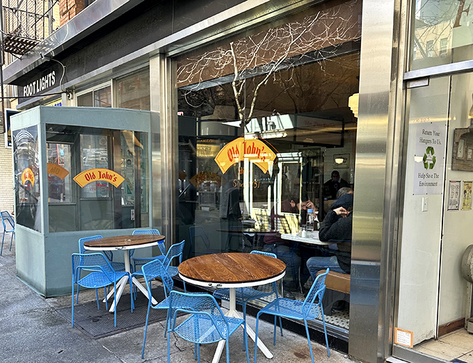 Old John's blue chairs invite you to linger over coffee and pancakes. The sidewalk seating is prime people-watching real estate!