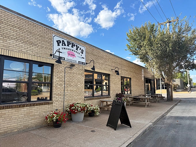 Pappy's simple brick building with colorful flower pots says "welcome home." No fancy frills needed when you're smoking meat this good!