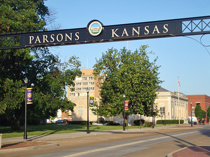 Parsons greets visitors with its landmark overhead sign spanning Main Street, proudly welcoming all to this friendly Kansas town.