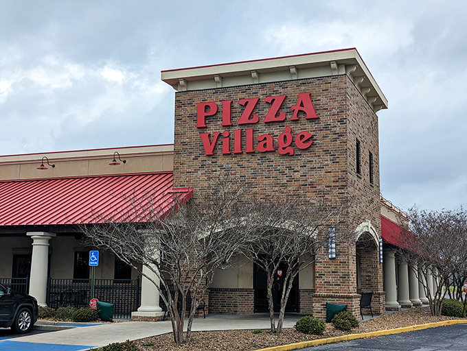 Pizza Village doesn't need fancy frills &ndash; just a brick tower announcing "serious pizza happens here."
